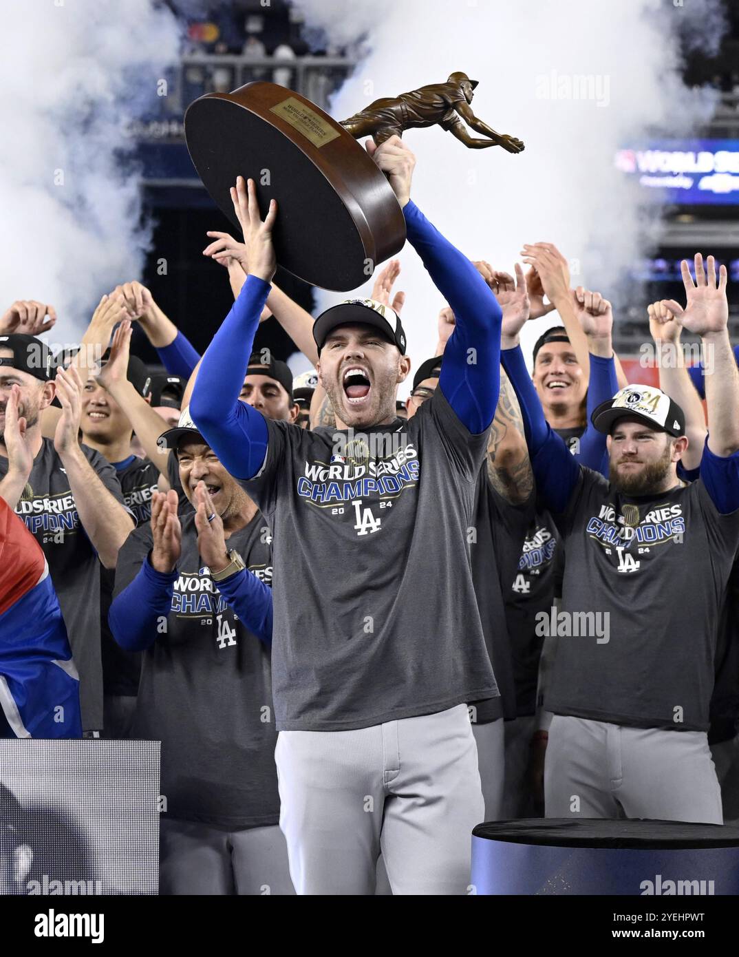 Los Angeles Dodgers infielder Freddie Freeman hoists the MLB World ...