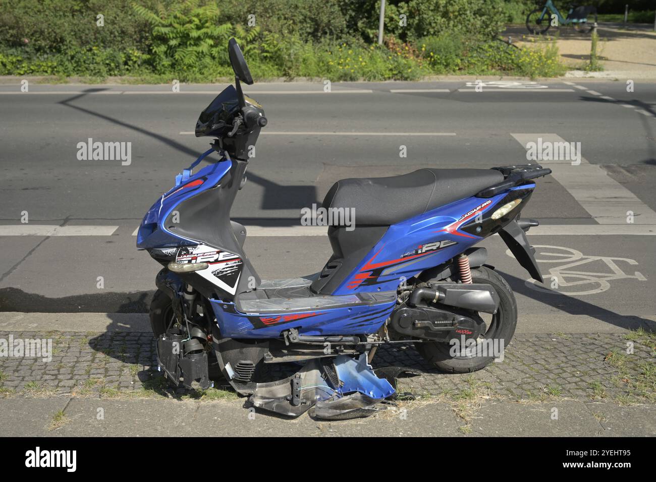Defective scooter after an accident Stock Photo - Alamy