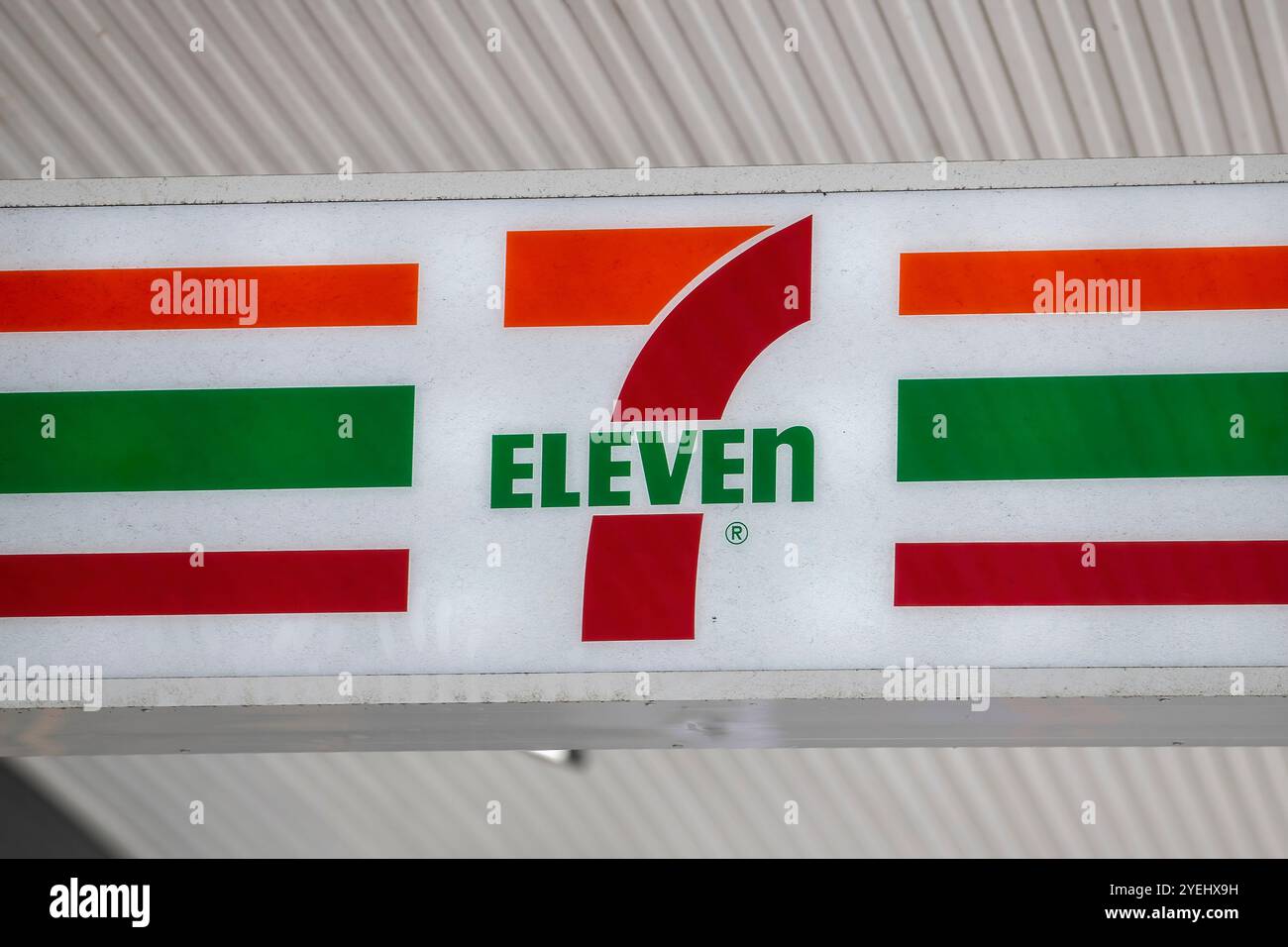 The 7-Eleven store sign featuring the iconic orange, green, and red ...
