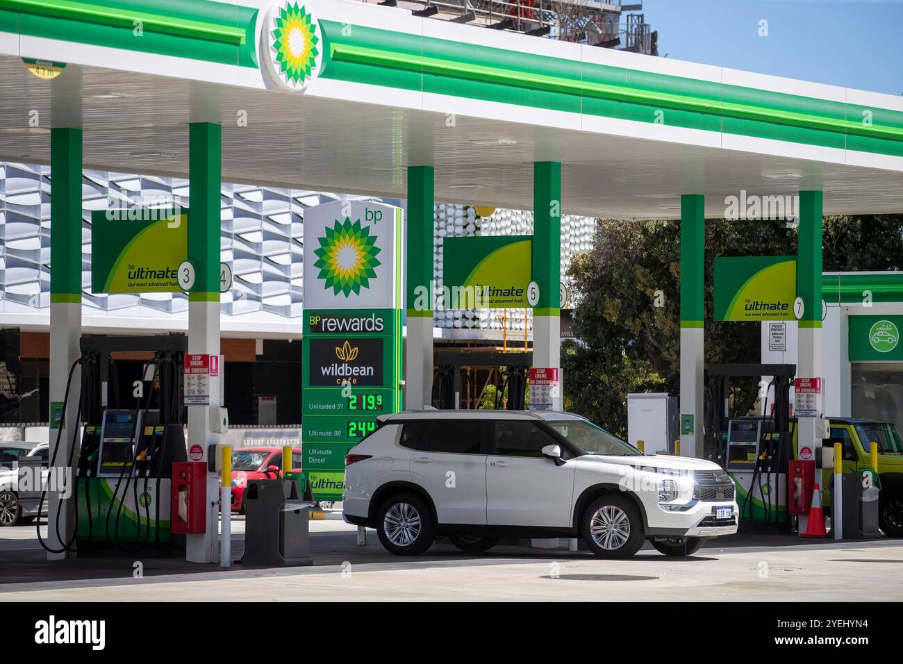 A BP gas station with multiple fueling bays, prominently featuring "BP ...
