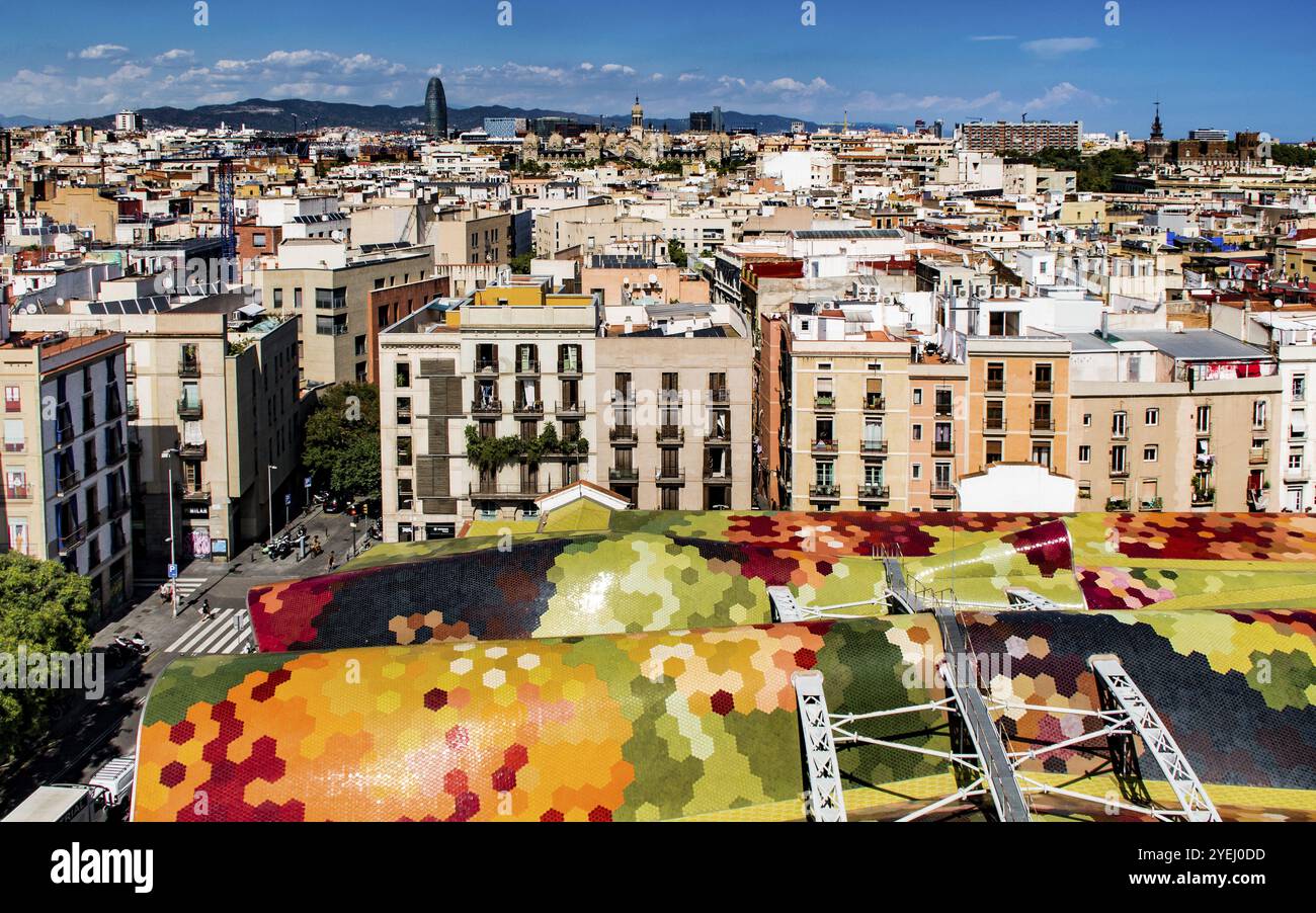 A vibrant cityscape with colorful hexagon-patterned rooftops and a ...
