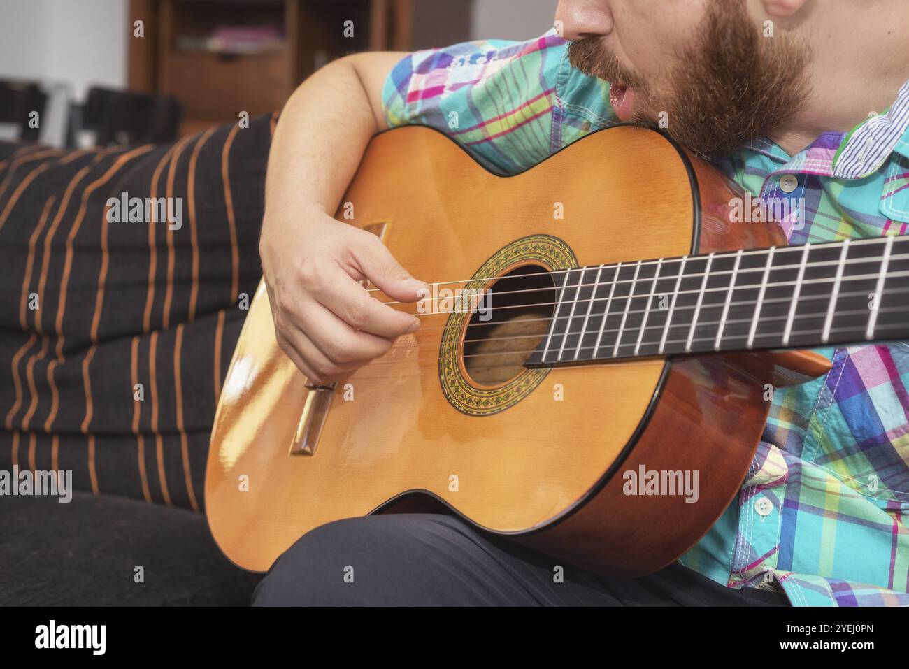 Mans hand playing acoustic guitar hi-res stock photography and images ...