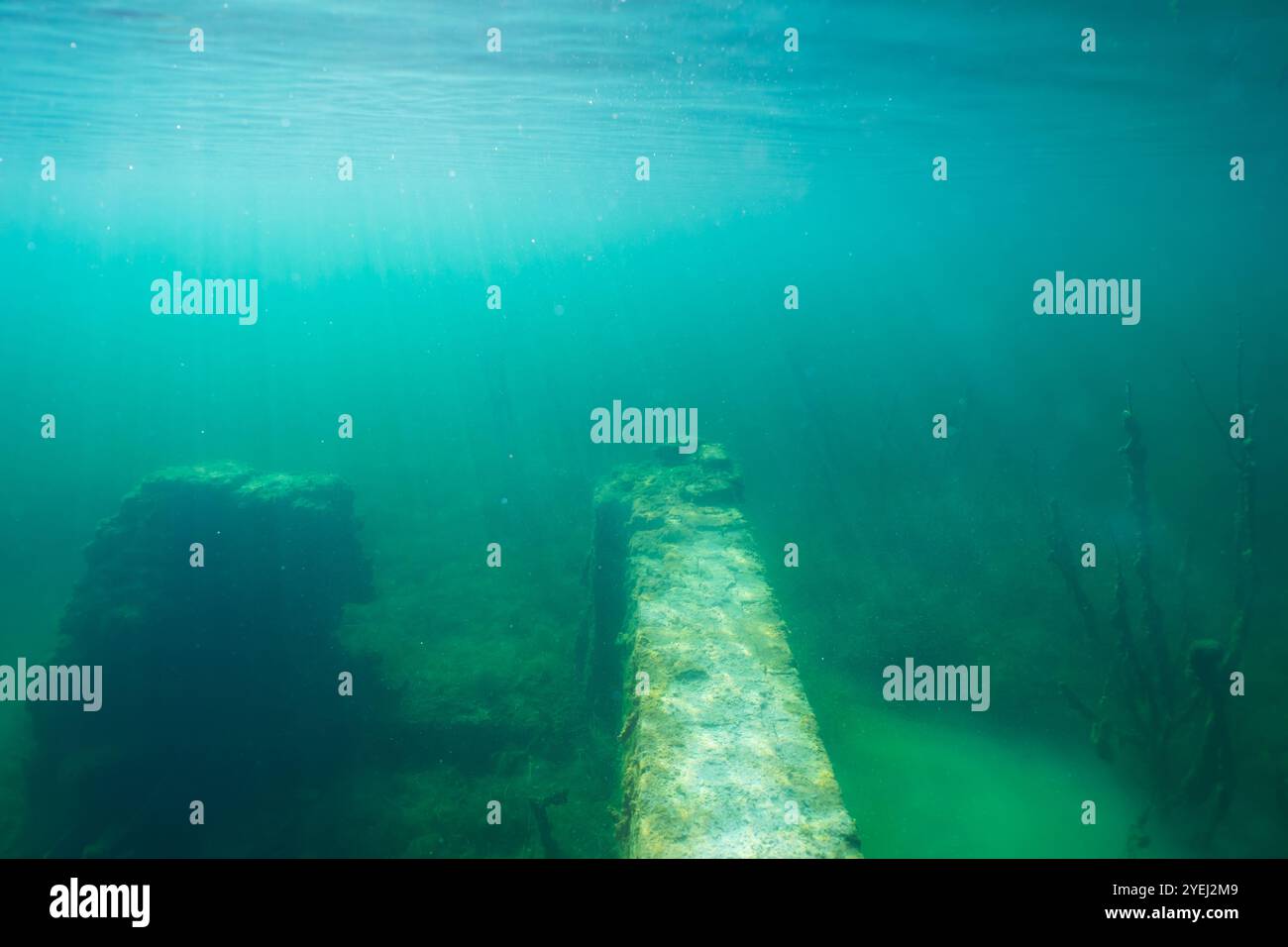 Underwater photo, ruins of a flooded prison at the Rummu quarry. Clear ...