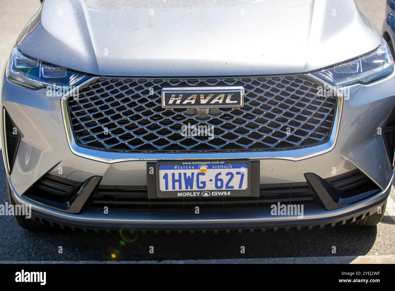 The image shows the front view of a Haval vehicle, focusing on the ...