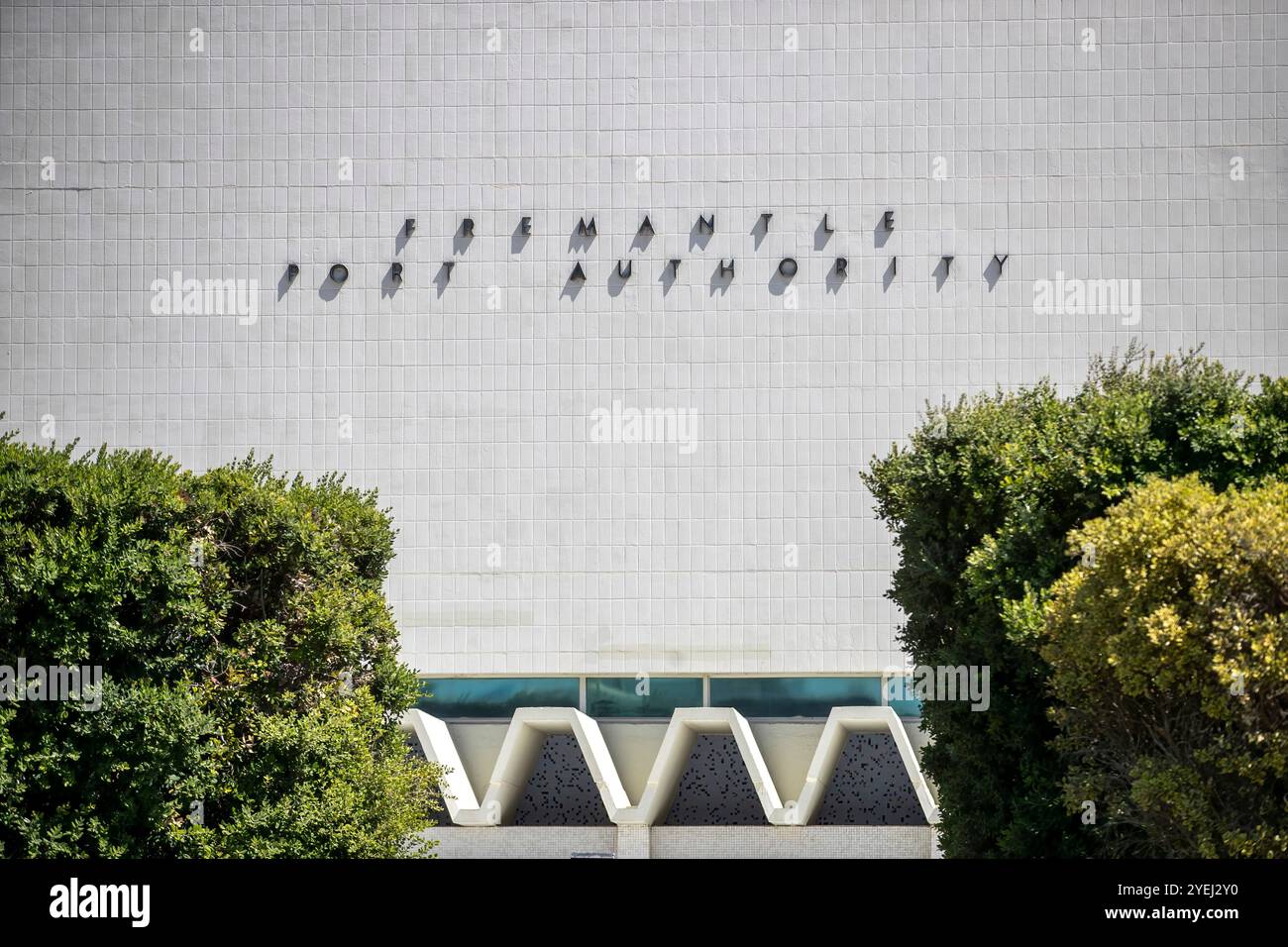 The image shows the facade of the Fremantle Port Authority building, a ...