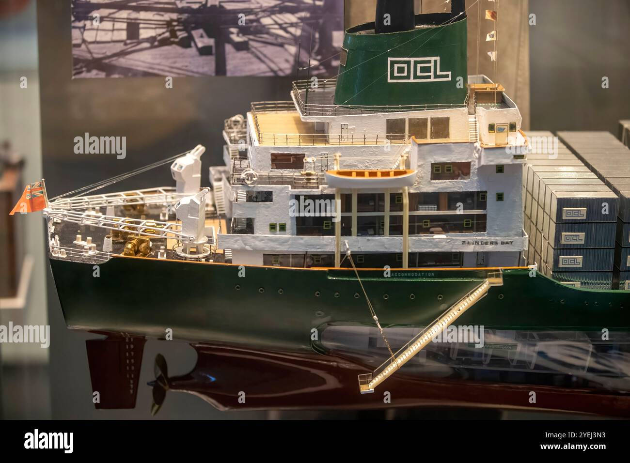 A detailed scale model of a container ship, showcasing the ...