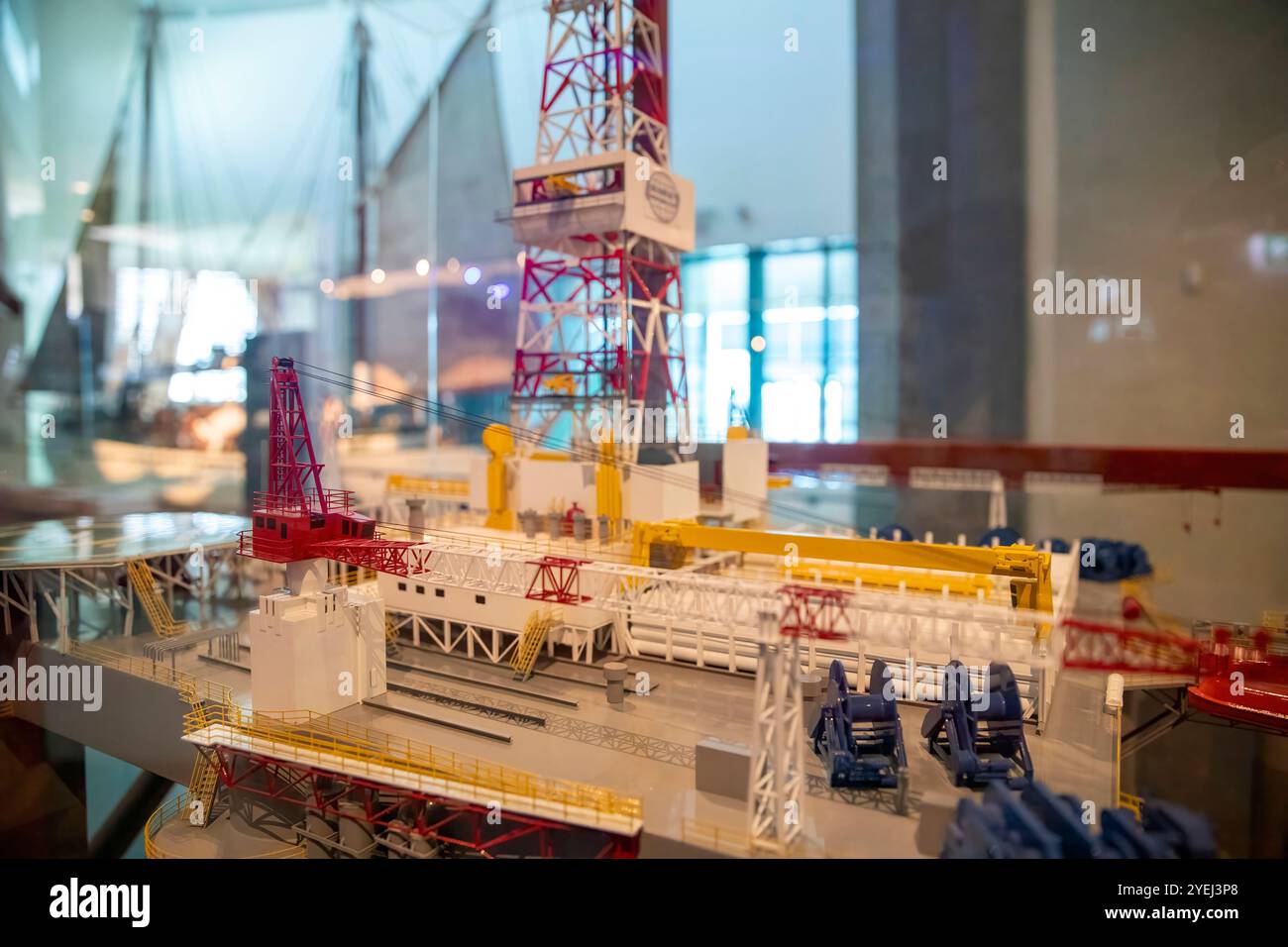 A detailed scale model of an offshore oil rig displayed in a museum ...