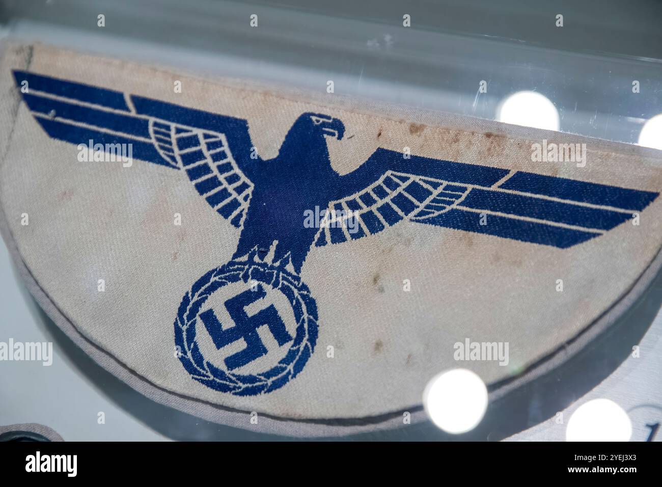 Close-up of a WWII German cloth insignia featuring a blue eagle holding ...