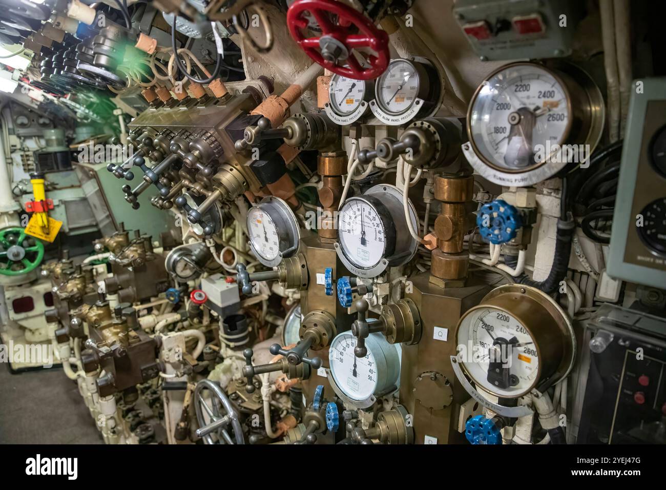 Detailed interior view of a submarine machinery room, featuring an ...
