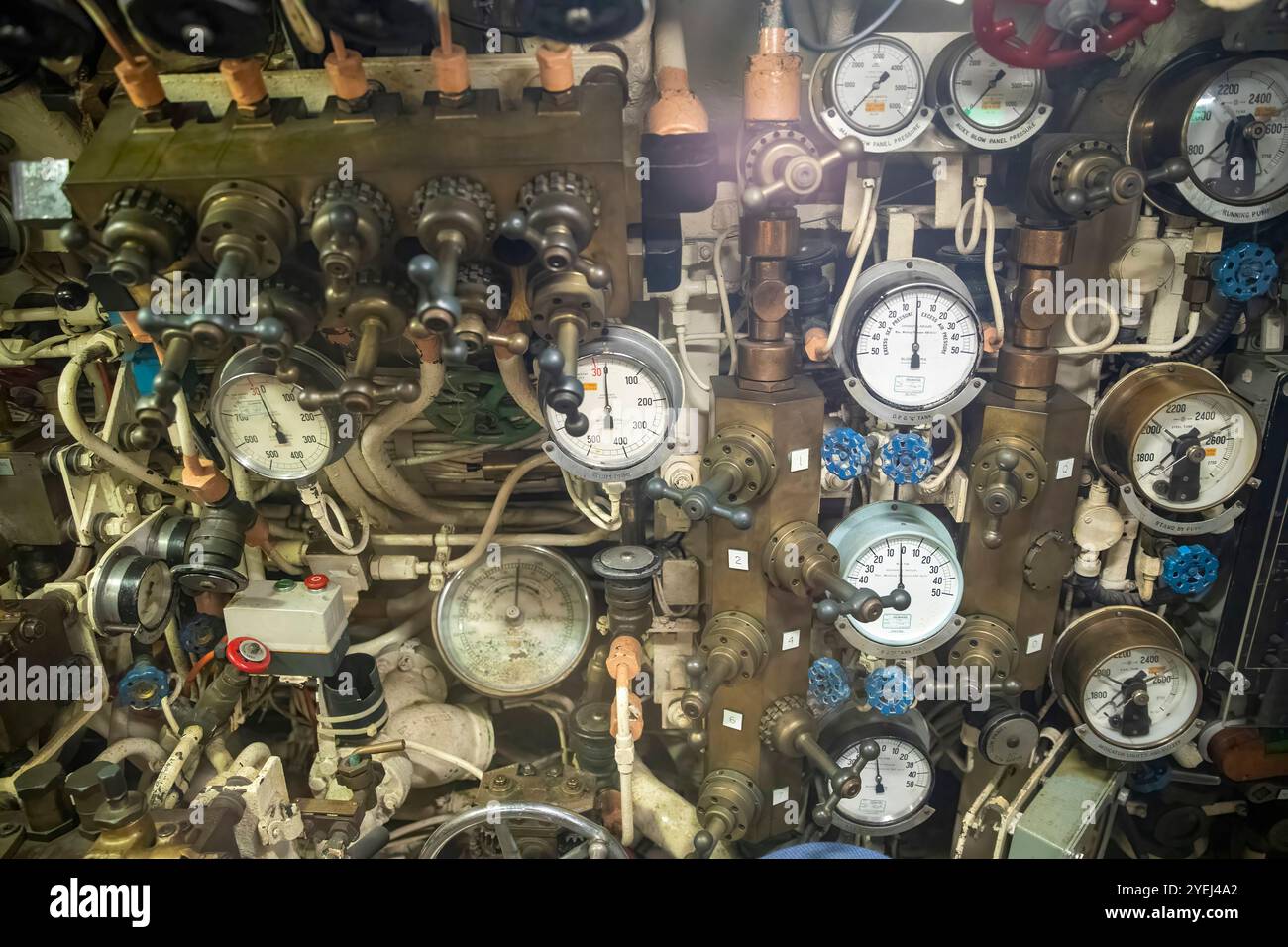 Close-up view of a complex submarine control panel filled with numerous ...