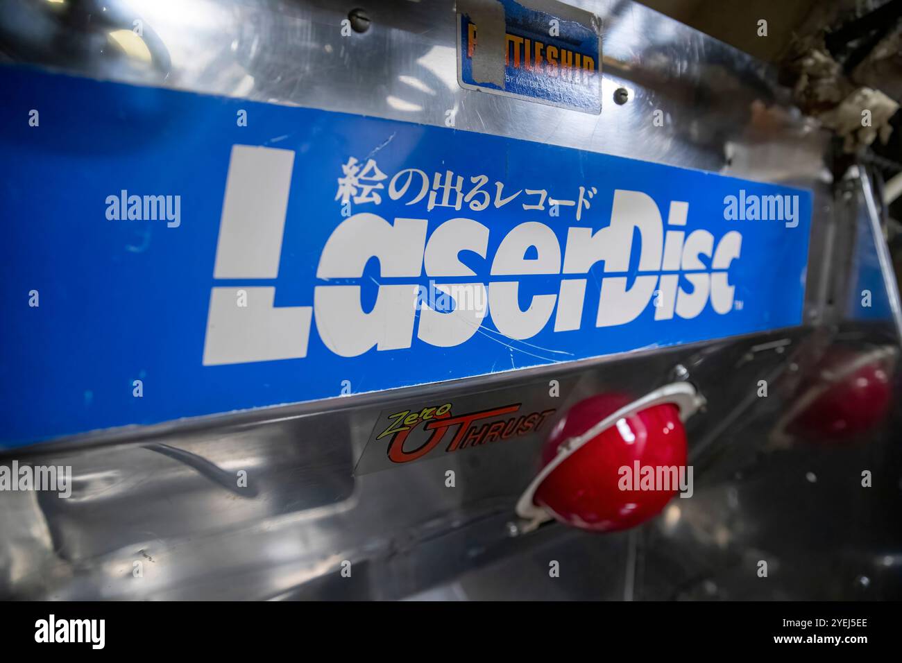 This photograph captures a close-up view of a blue and white "LaserDisc ...