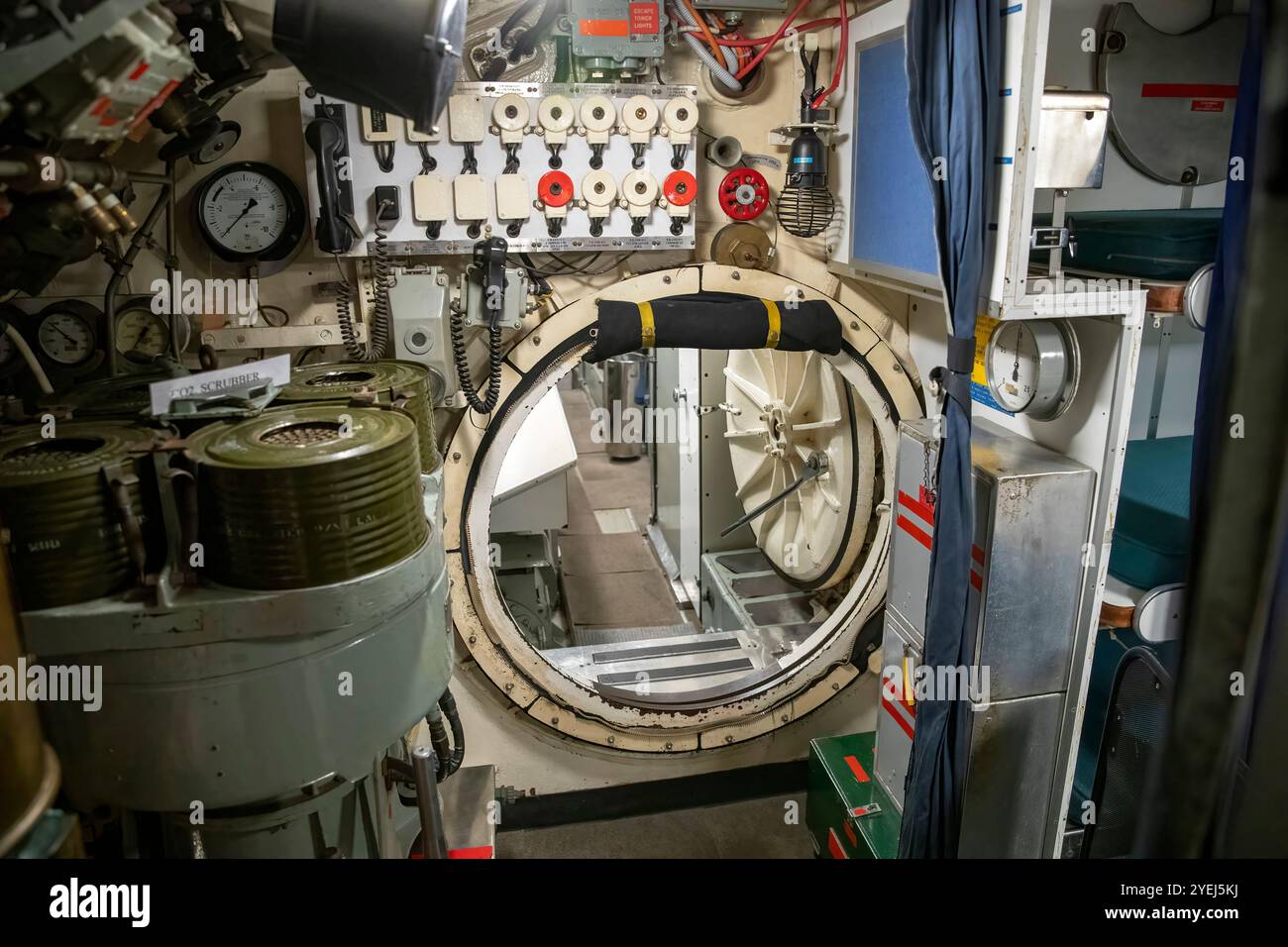 This photograph provides an interior view of a submarine, showcasing a ...