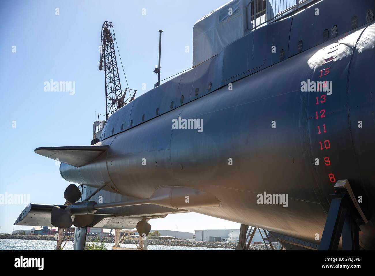 This photograph shows the rear section of a submarine, including its ...