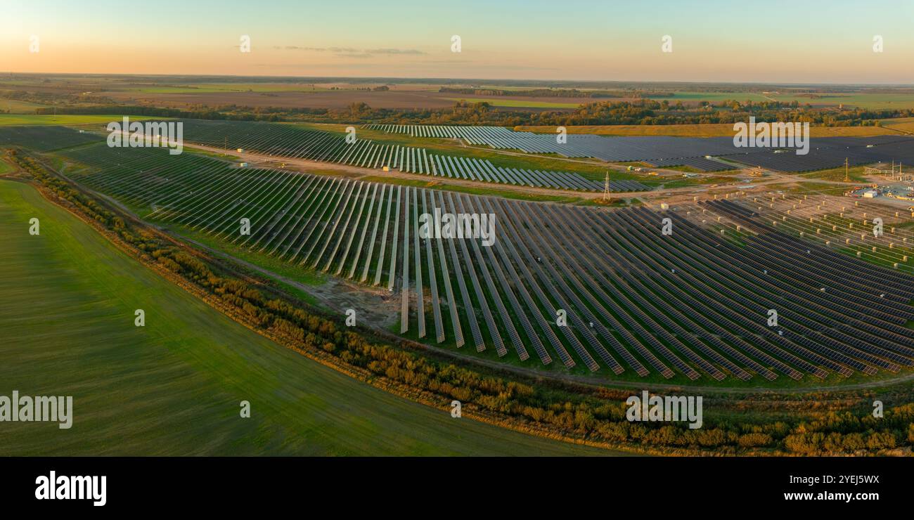Expansive Solar Farm in Rural Lithuania at Sunset Stock Photo - Alamy