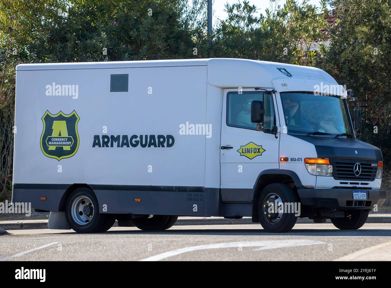 Side view of an Armaguard armored van for cash-in-transit services ...