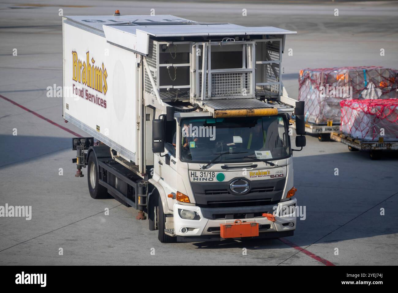 A white food services truck HINO 500 branded "Brahim's Food Services ...