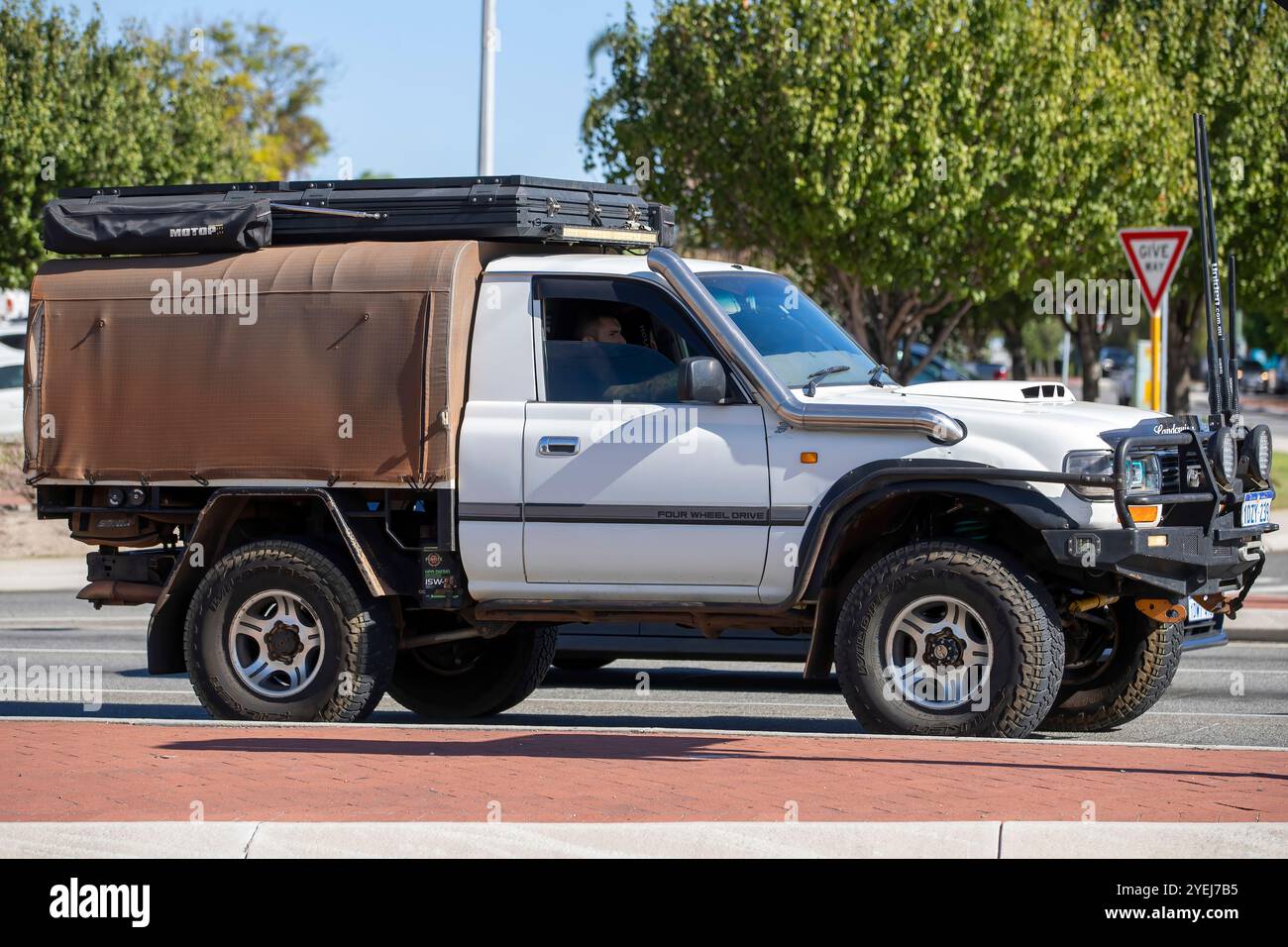 A modified Toyota Land Cruiser 4WD vehicle equipped with off-road ...