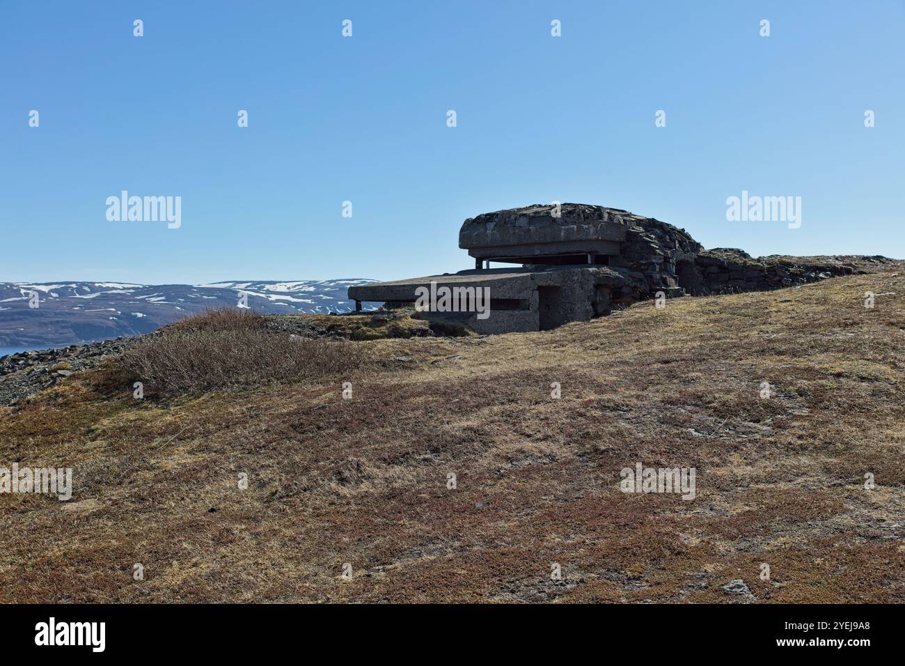 View of old WW2 German bunkers at Veidnes in clear blue sky weather in ...