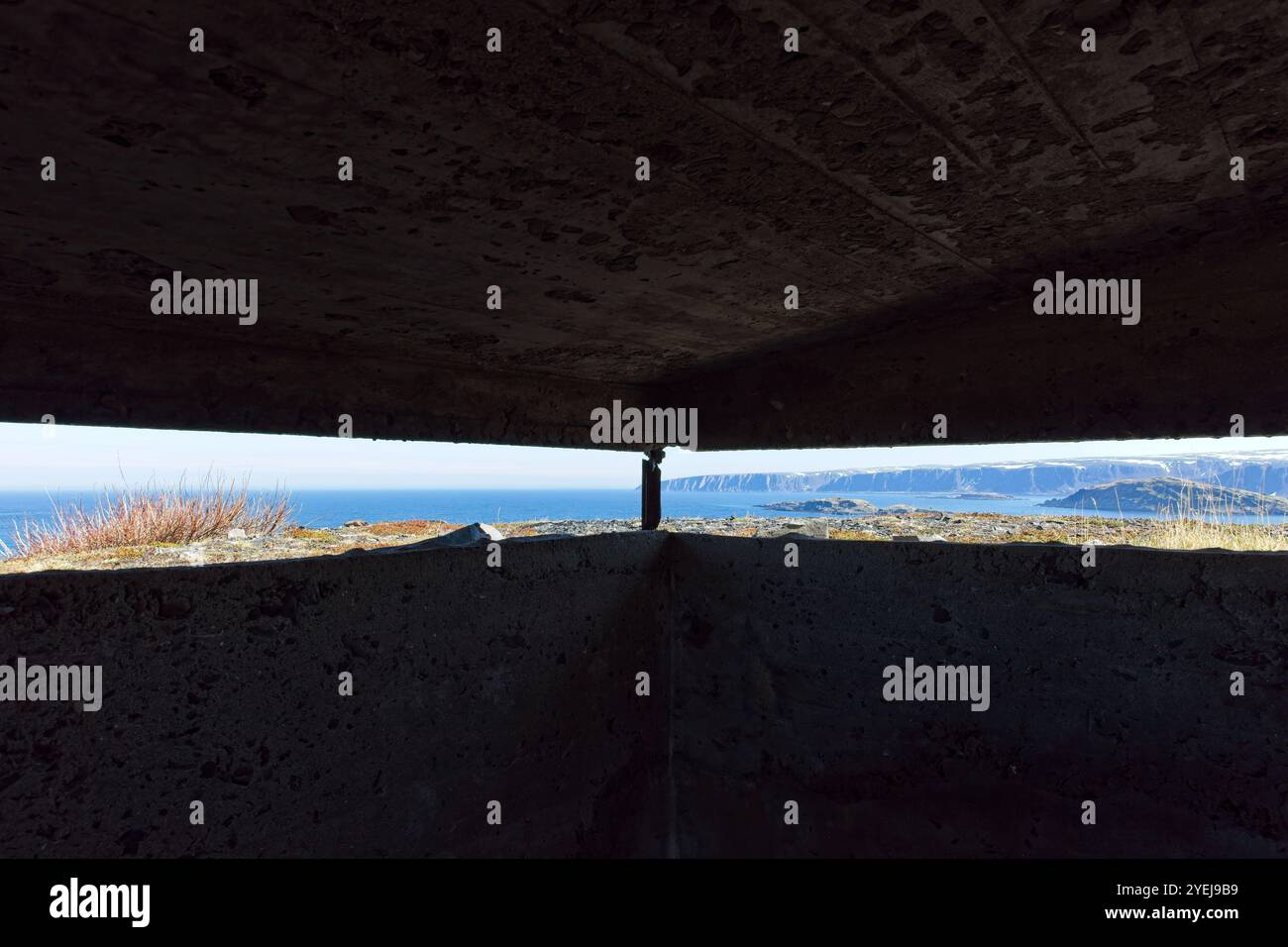 View from inside of old WW2 German bunkers at Veidnes in clear blue sky ...
