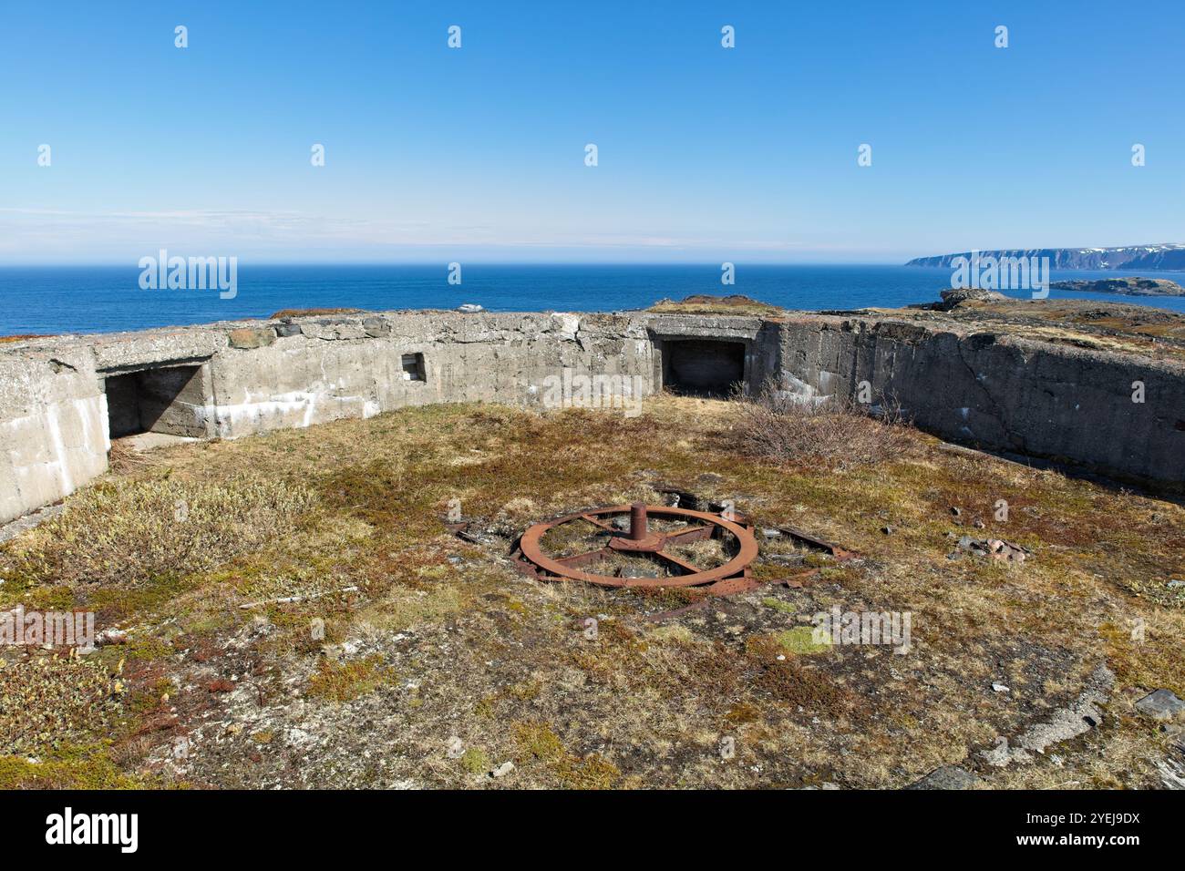 View of old WW2 German artillery battery site at Veidnes in clear blue ...