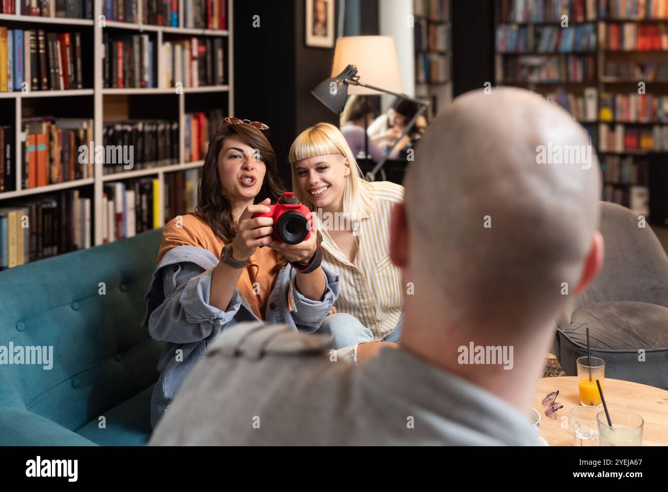 Group of creative and smart young students discussing work, sharing ideas for a project, having ...