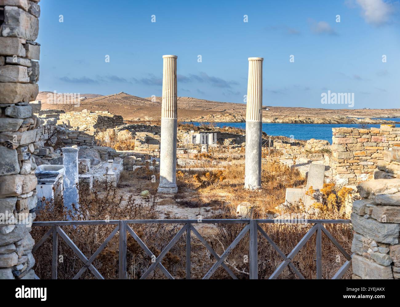 Columns and stonewalls on the excavation site of Delos, Greece Stock ...