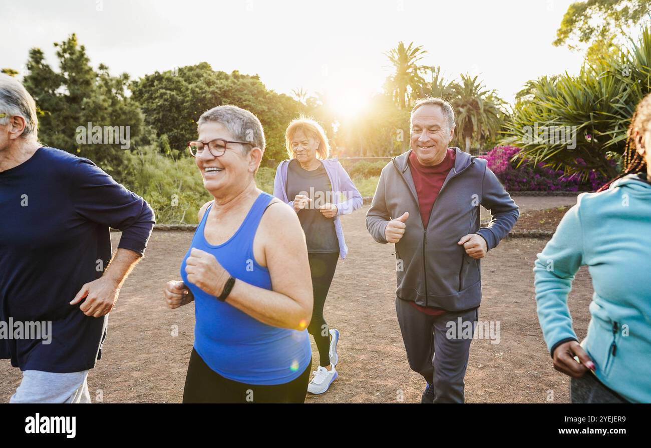 Senior people running at city park - Group of elderly friends doing ...