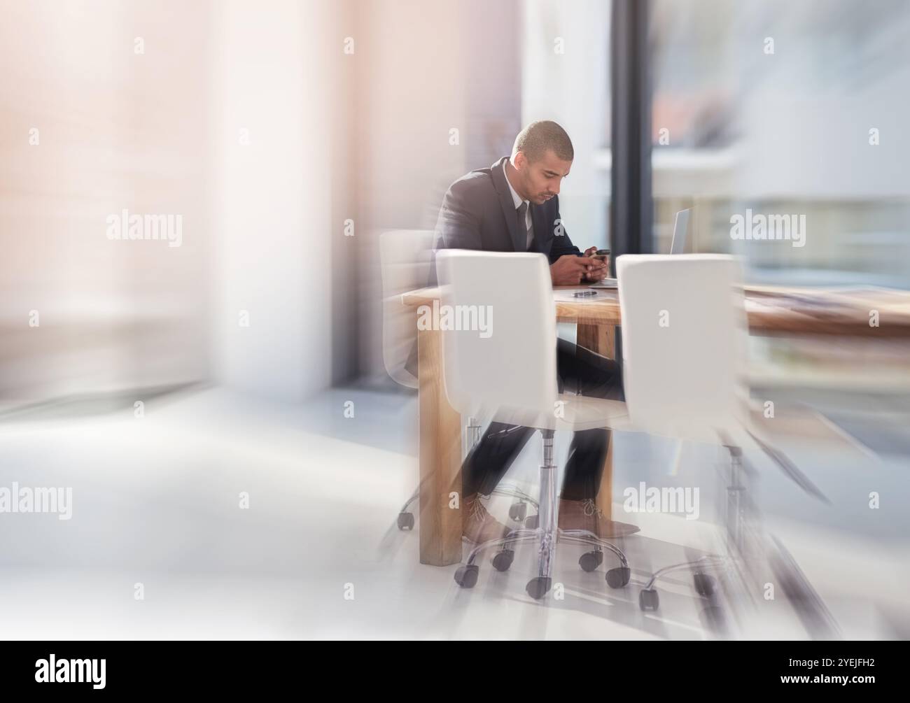 Businessman typing phone blur hi-res stock photography and images - Alamy