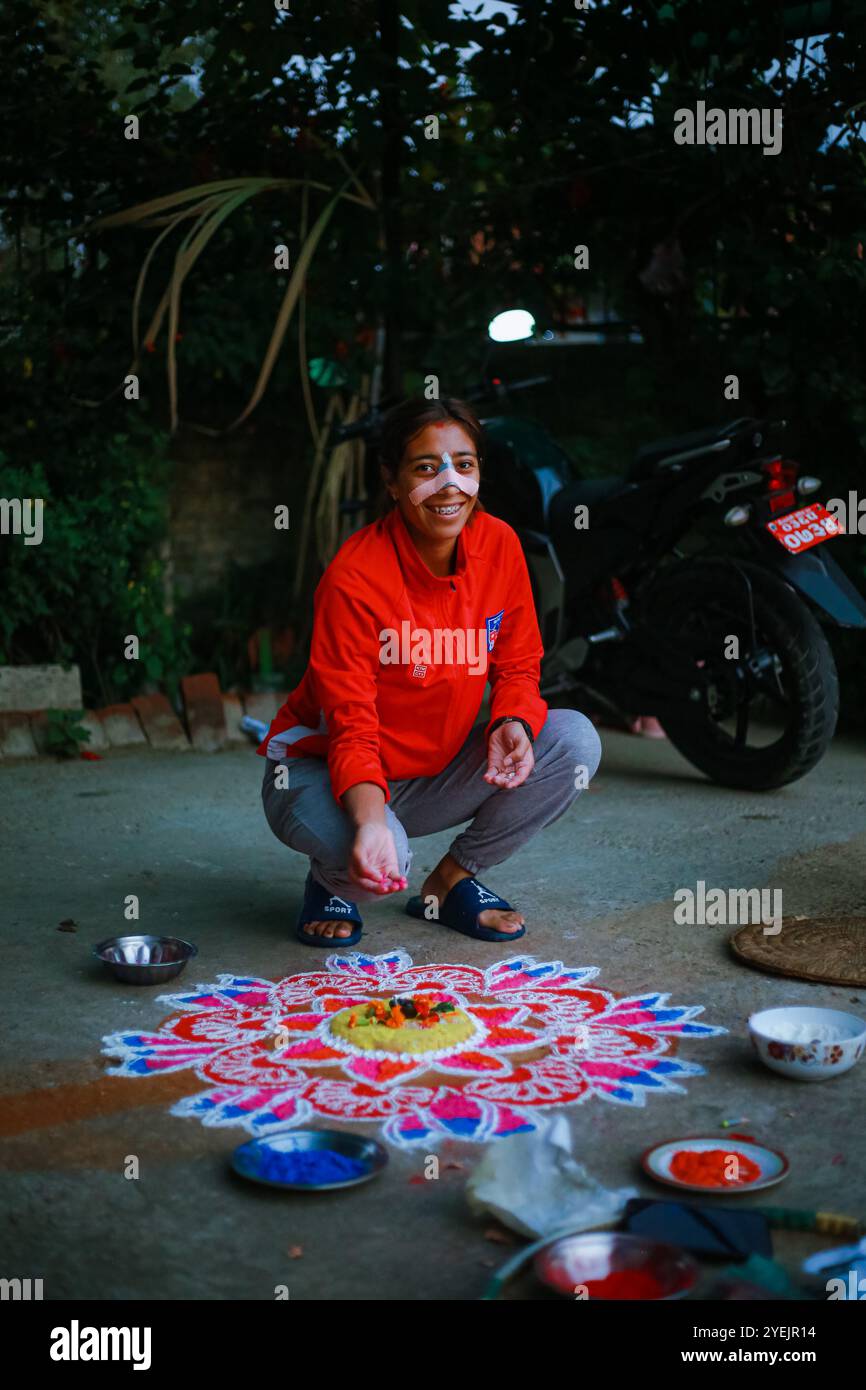 Bhaktapur, Bagmati, Nepal. 31st Oct, 2024. Girls making Rangoli li ...