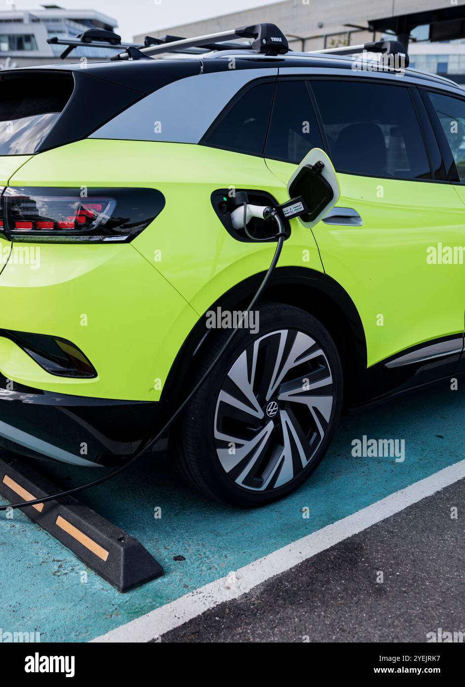 Minsk, Belarus, October 31, 2024 - VW id4 electric car connected to the ...