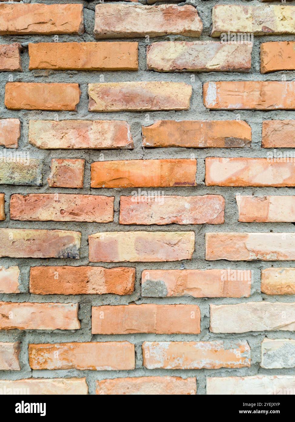 Rustic Orange and Beige Brick Wall Stock Photo - Alamy