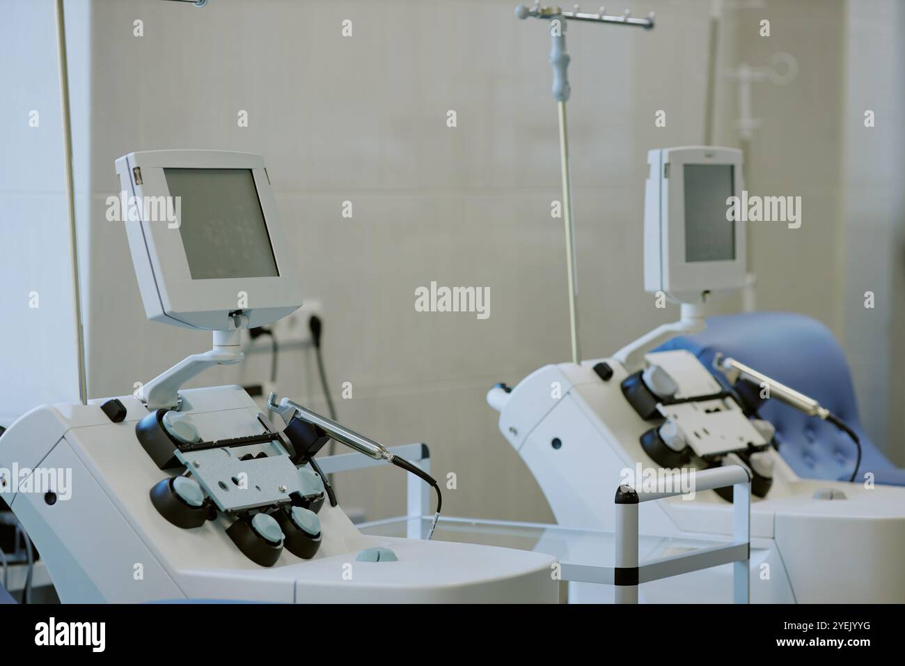 Advanced medical monitors and devices in hospital ward showcasing ...