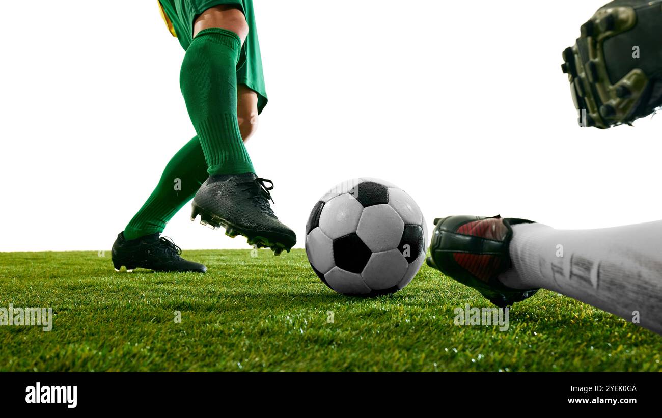 dynamic photo of one player chasing after soccer ball while another ...