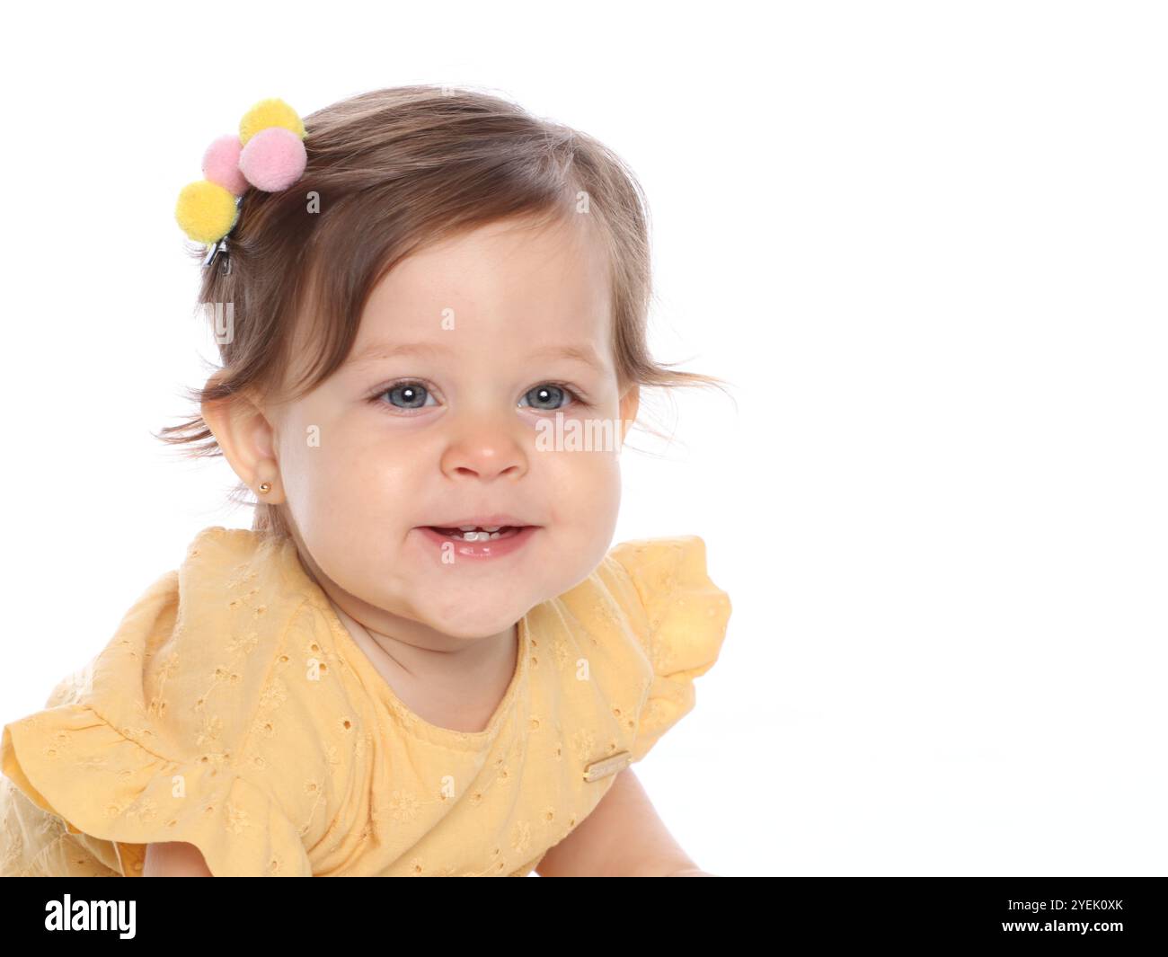 A close-up Beautiful Blue-eyed Baby Girl Smiling in Studio Shot ... A close-up Beautiful Blue-eyed Baby Girl Smiling in Studio Shot ...