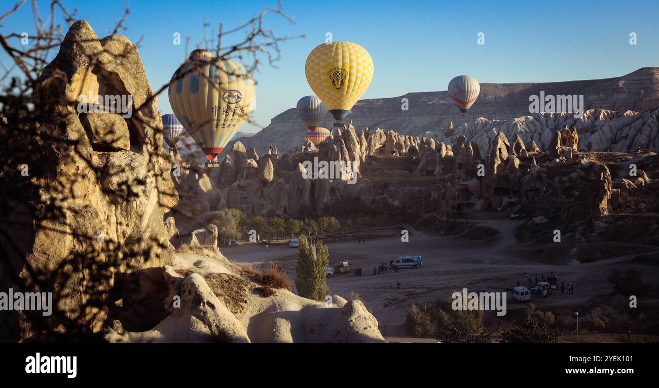 Cappadocia's breathtaking landscape is illuminated at dawn featuring ...