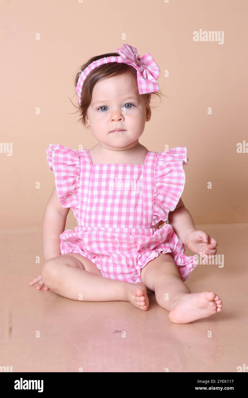 Beautiful Blue Eyed Baby Girl in Studio Photo Wearing Pink Checkered ...