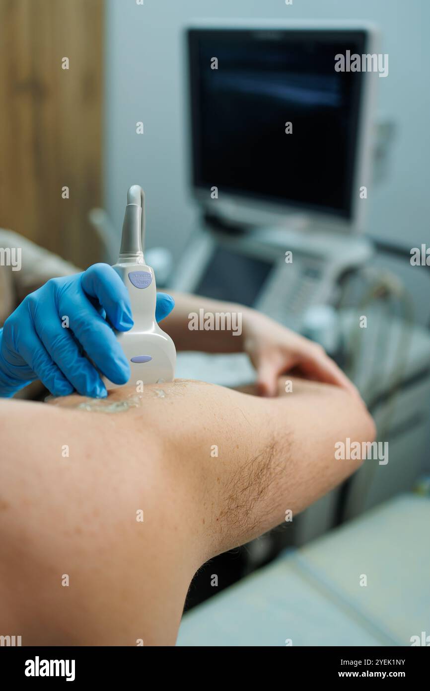 Sonographer using ultrasound machine hi-res stock photography and ...