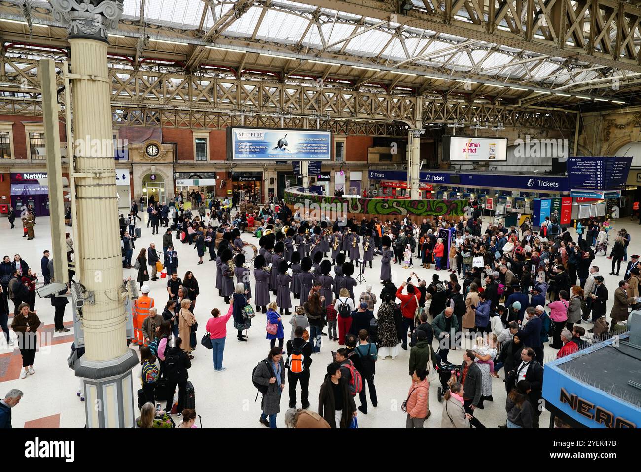 The Band of the Scots Guards entertain commuters during the Royal ...