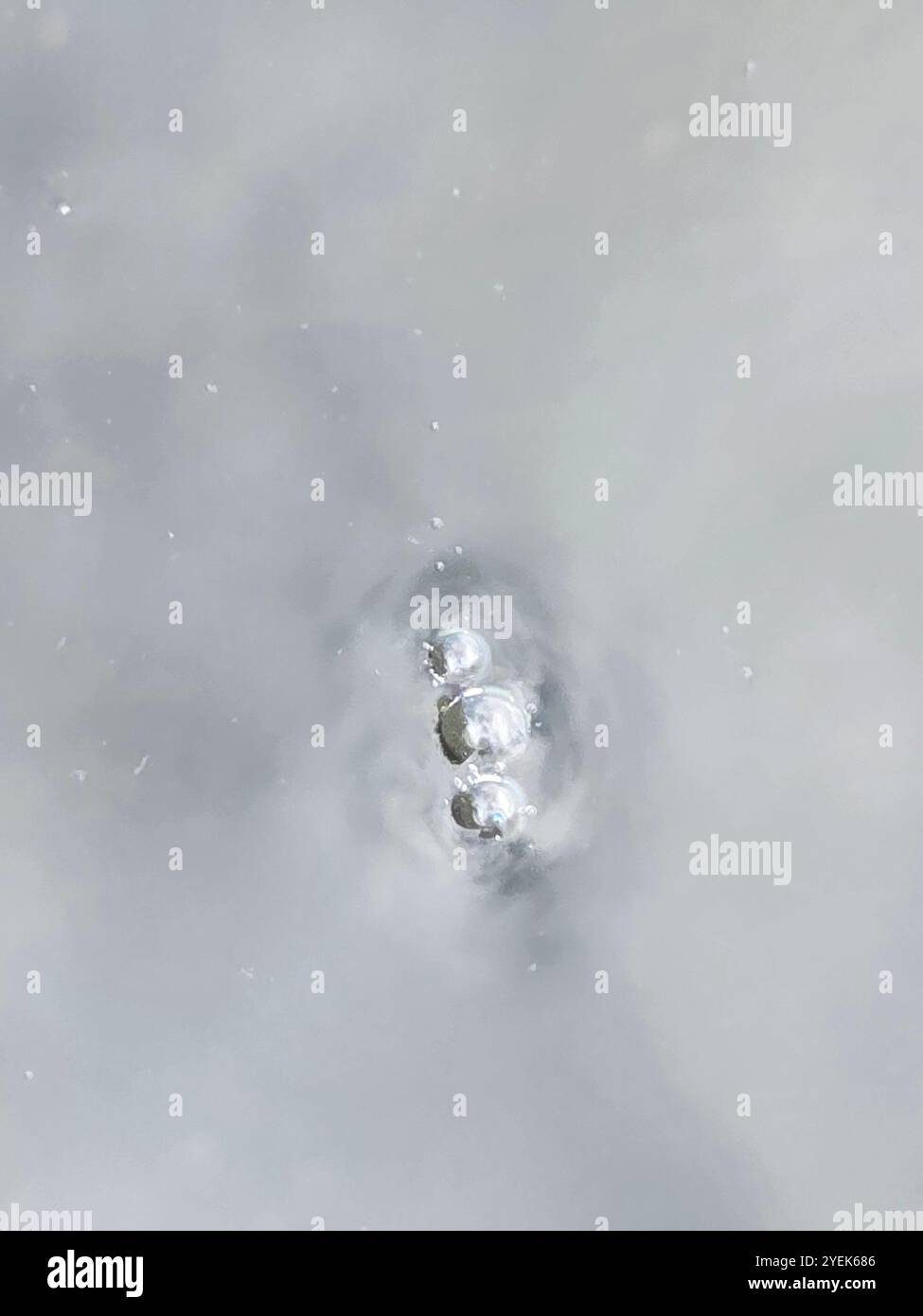 Air bubbles in a steamy onsen water in Ibusuki, Kyushu, Japan Stock ...