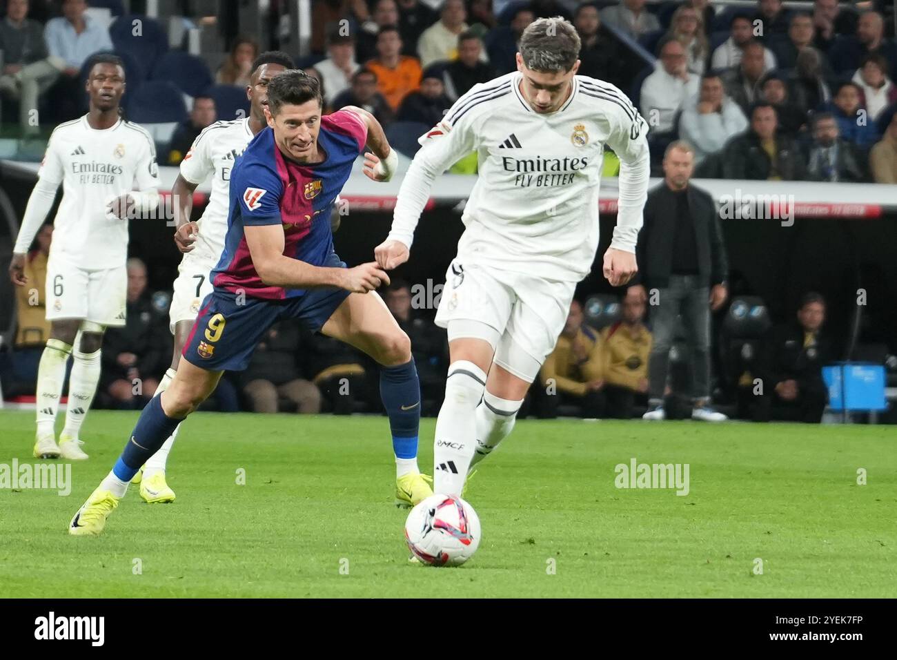 Robert Lewandowski of Barcelona and Federico Valverde of Real Madrid ...