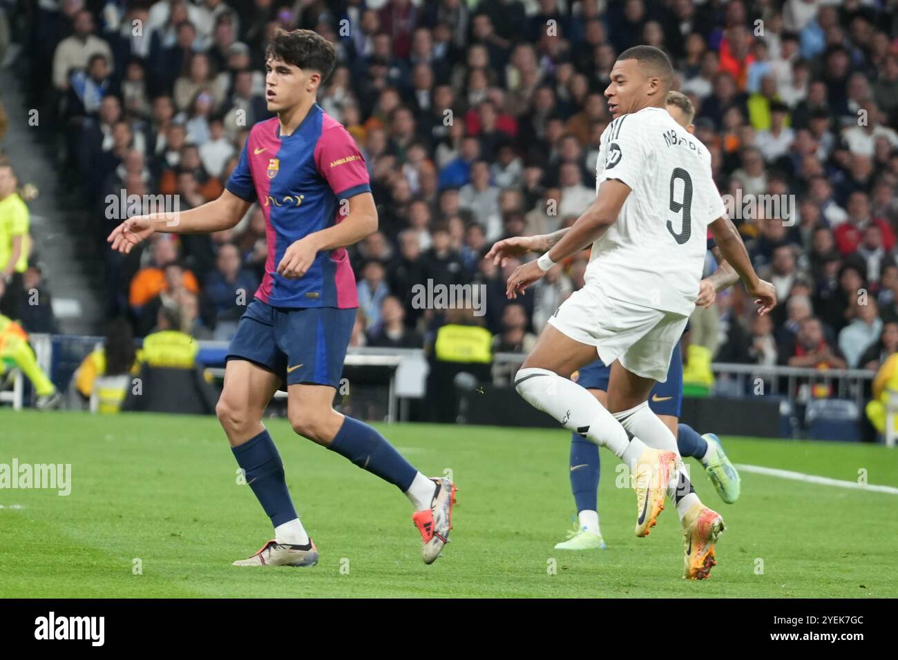 Pau Cubarsí of Barcelona and Kylian Mbappé of Real Madrid during the ...