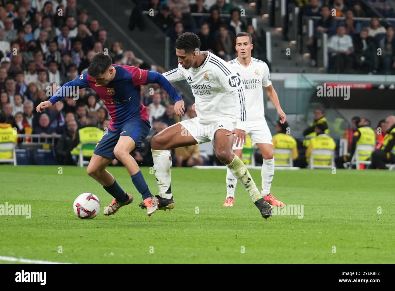 Pedri of Barcelona and Jude Bellingham of Real Madrid during the ...