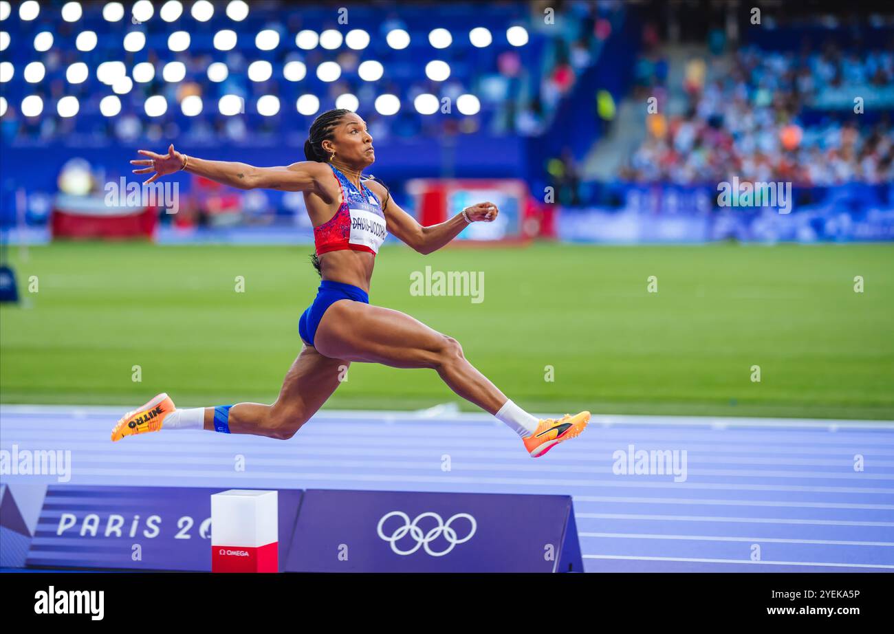 Tara Davis-Woodhall participating in the long jump at the Paris 2024 ...
