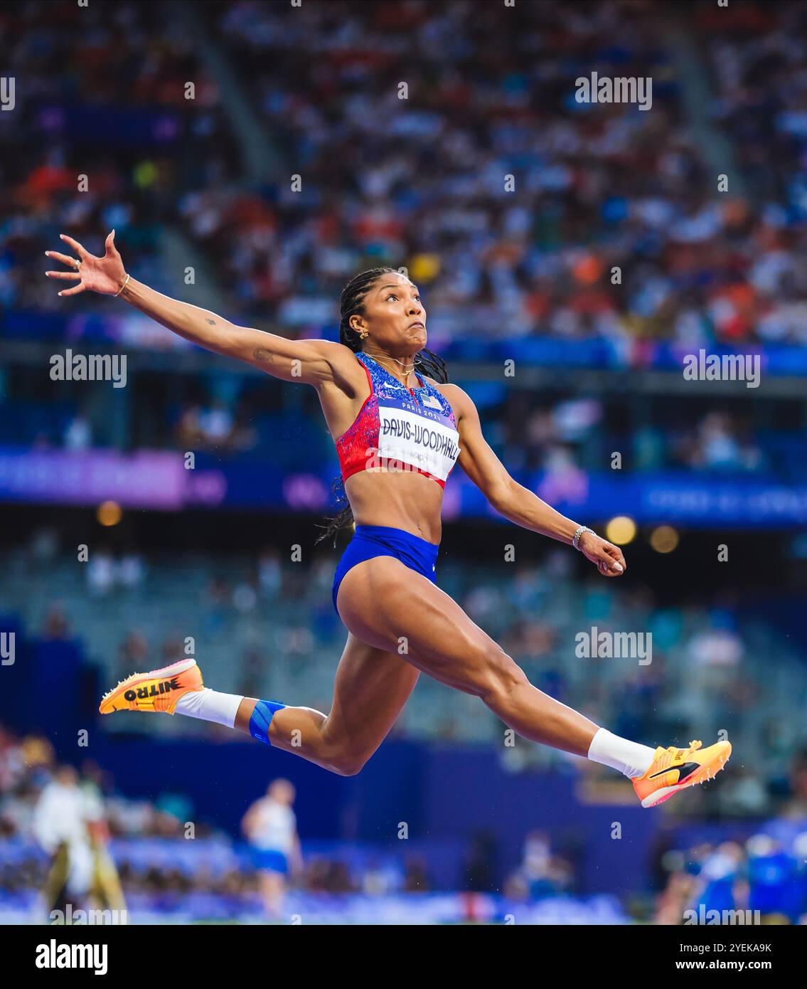 Tara Davis-Woodhall participating in the long jump at the Paris 2024 ...