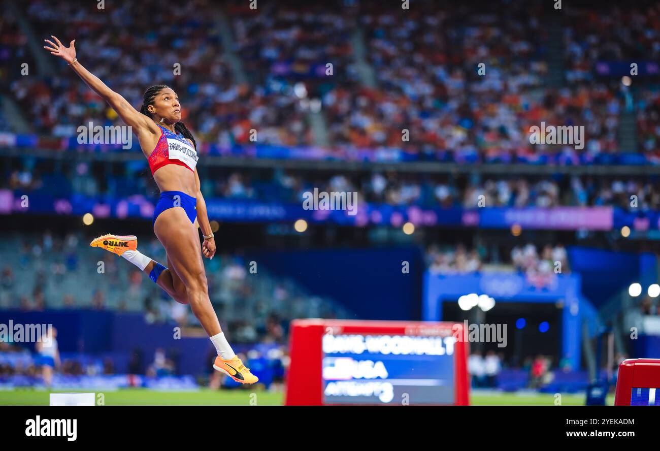 Tara Davis-Woodhall participating in the long jump at the Paris 2024 ...