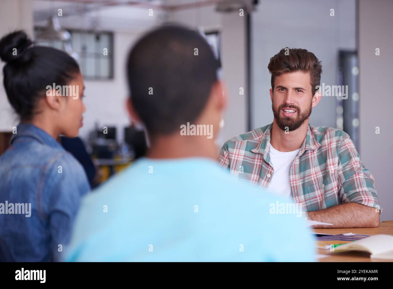 Business man, office and staff meeting of team with reporter ...