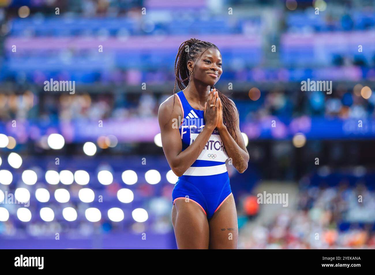 Hilary Kpatcha participating in the long jump at the Paris 2024 Olympic ...