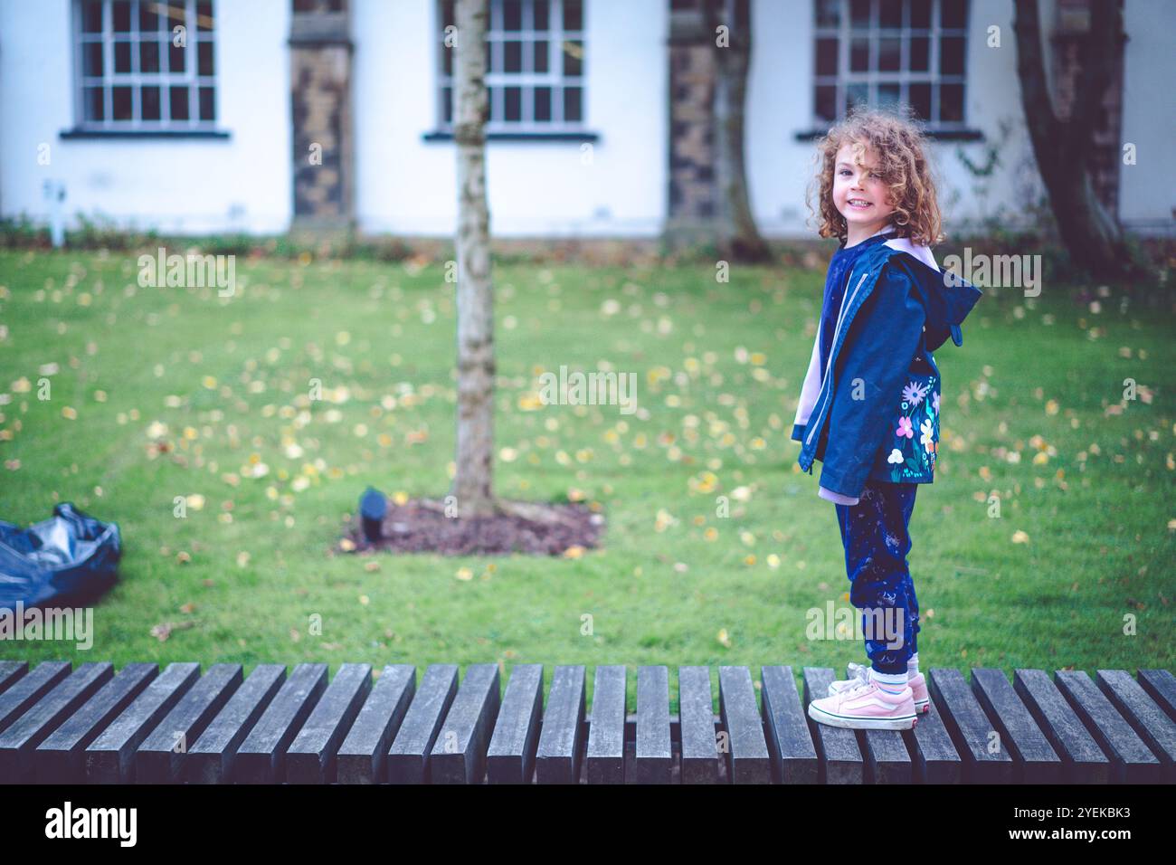 Child posing for photo on a path Stock Photo - Alamy
