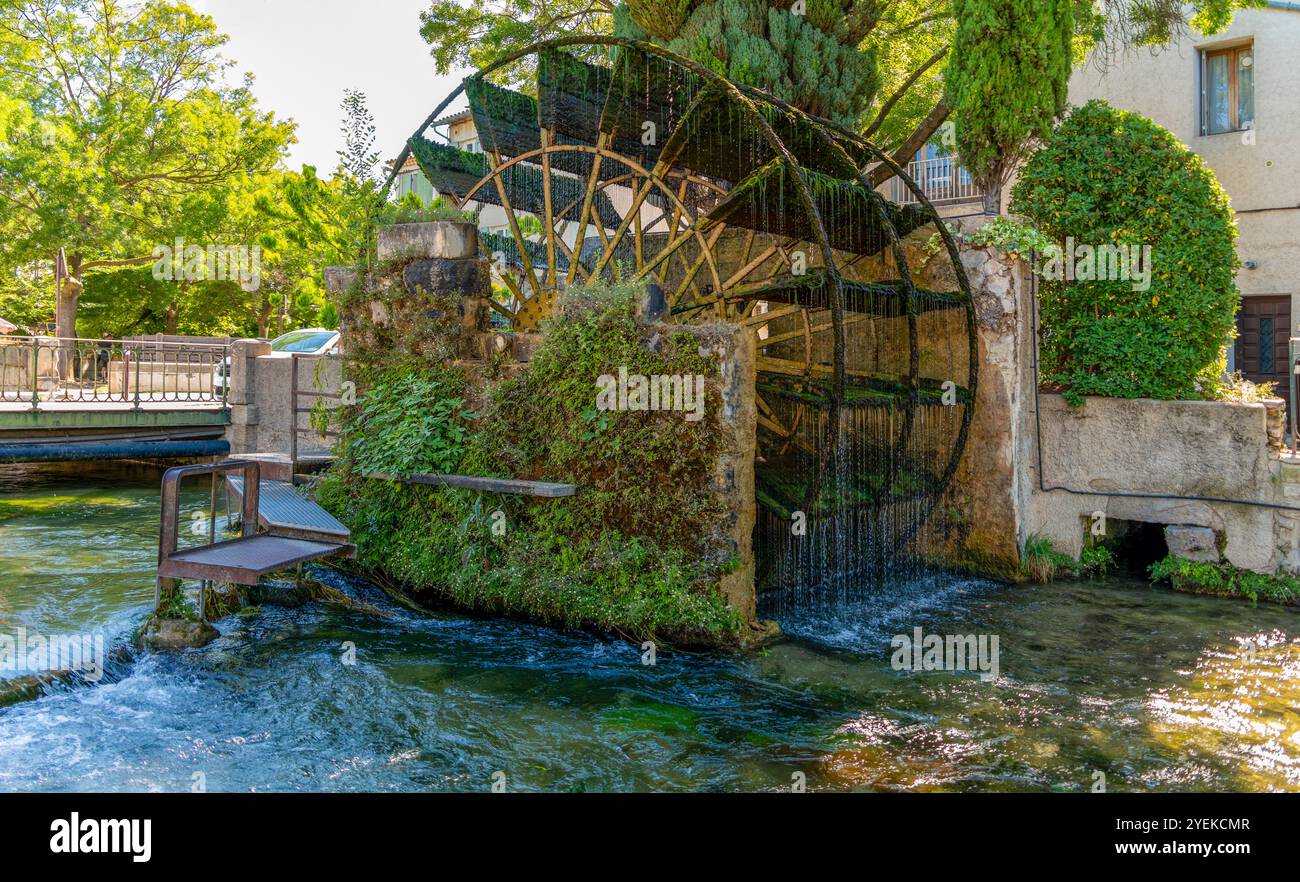 Water wheel at L'Isle-sur-la-Sorgue, a town and commune on the Sorgue ...