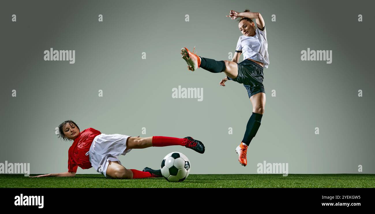 Rainy weather training session. Powerful action of two female soccer ...